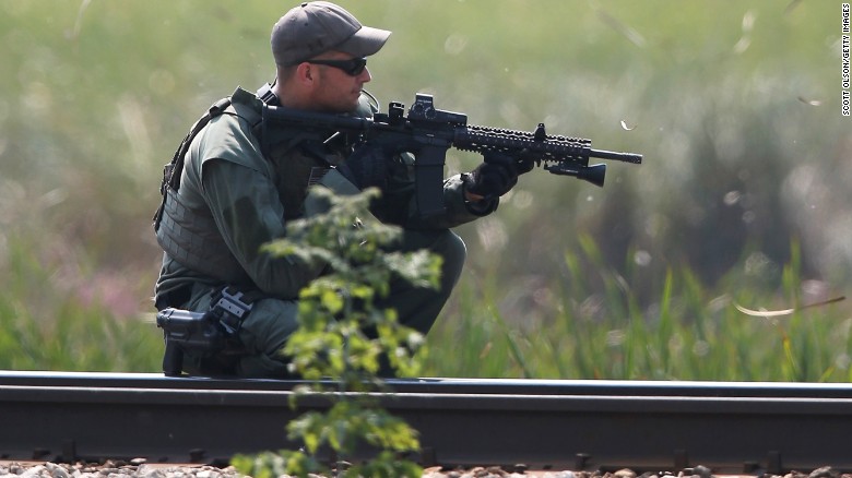 Massive Manhunt After Officers Death Cnn
