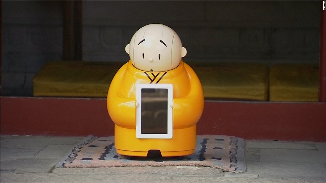 This robot monk teaches Buddhism - CNN Video
